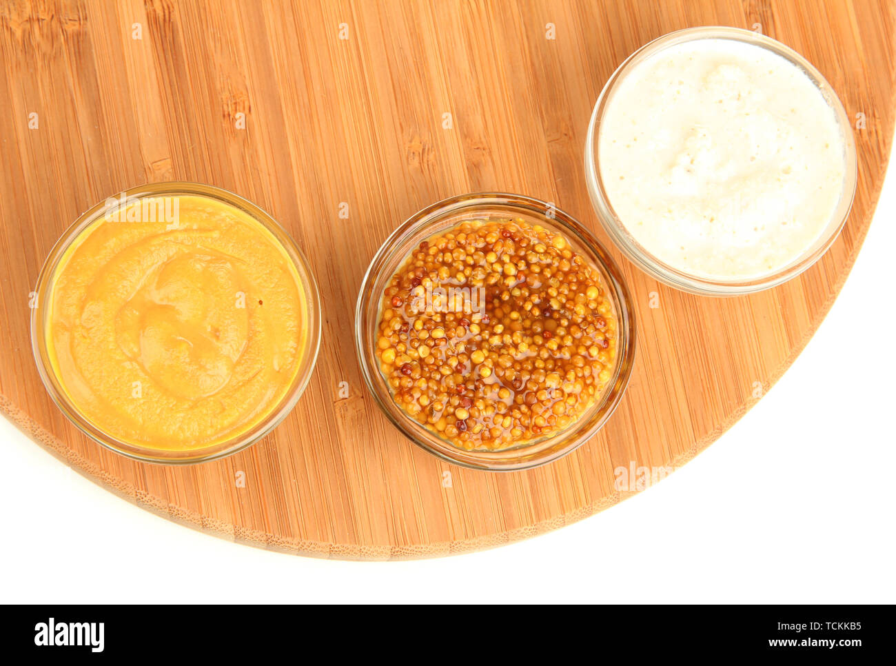 various sauces on chopping board isolated on white Stock Photo - Alamy