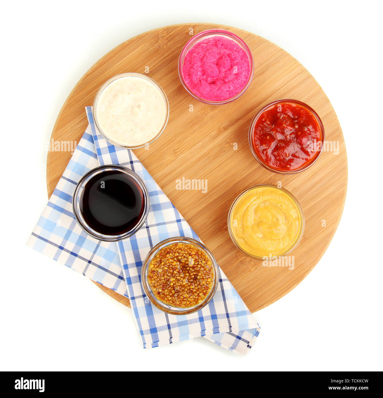 various sauces on chopping board isolated on white Stock Photo - Alamy