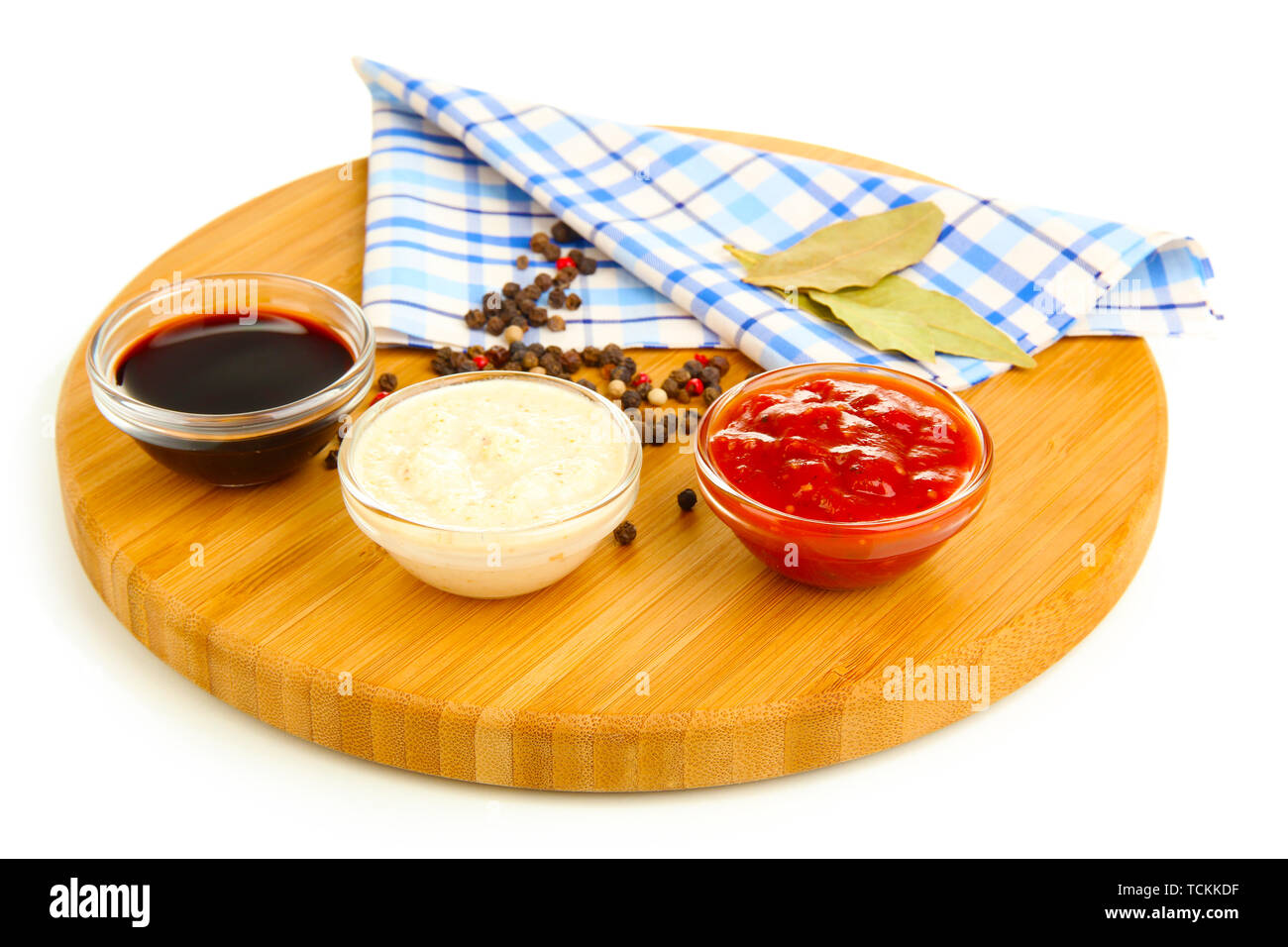 various sauces on chopping board isolated on white Stock Photo - Alamy
