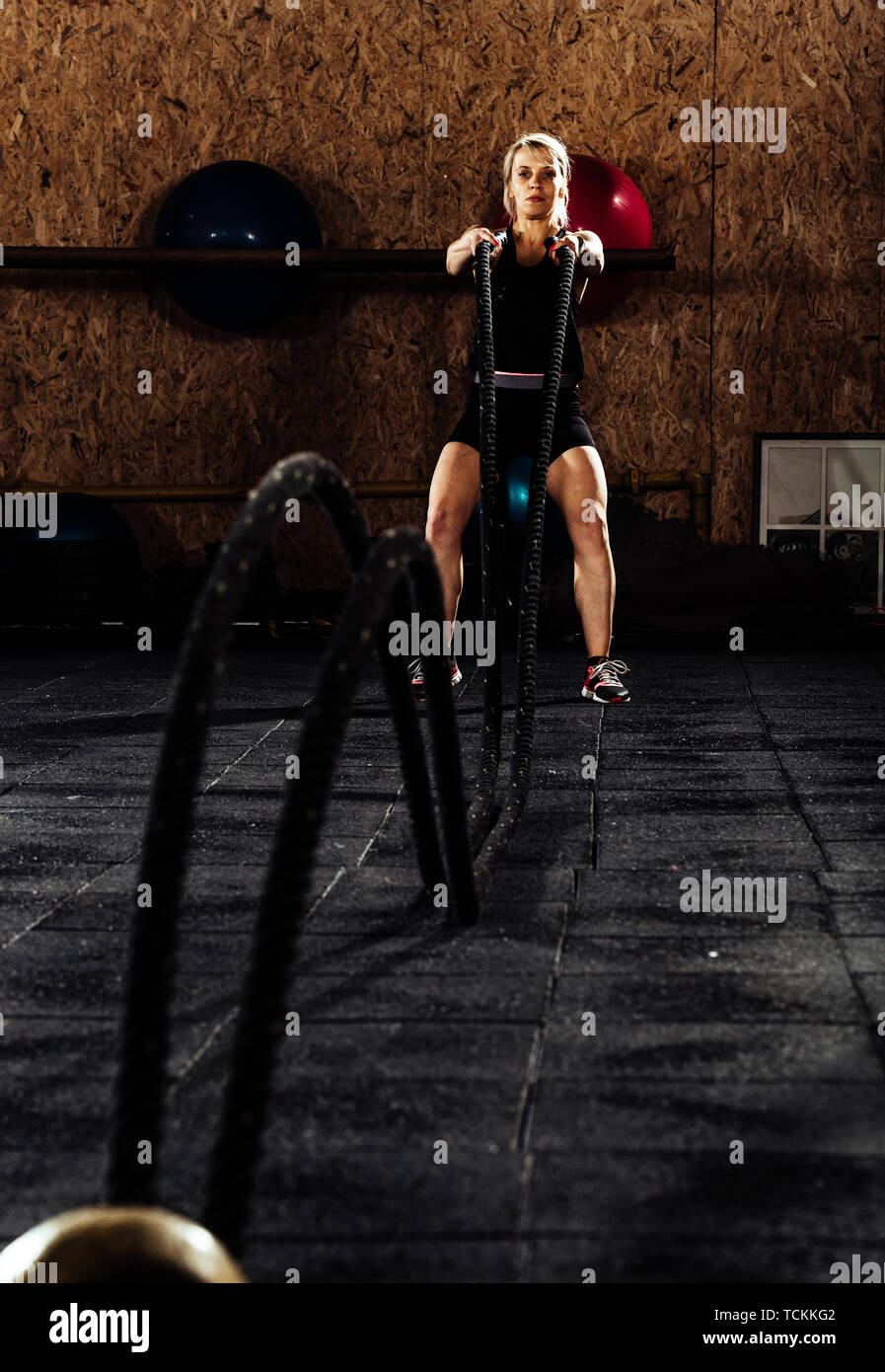 Battle rope training as functional fitness at the crossfit gym Stock ...