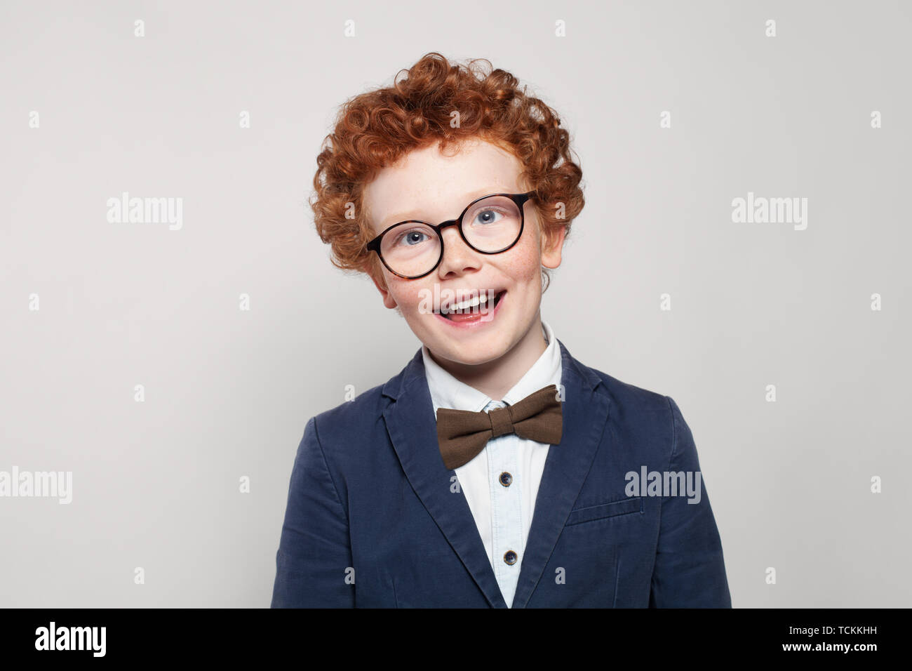 Happy child smart student boy in suit portrait Stock Photo - Alamy
