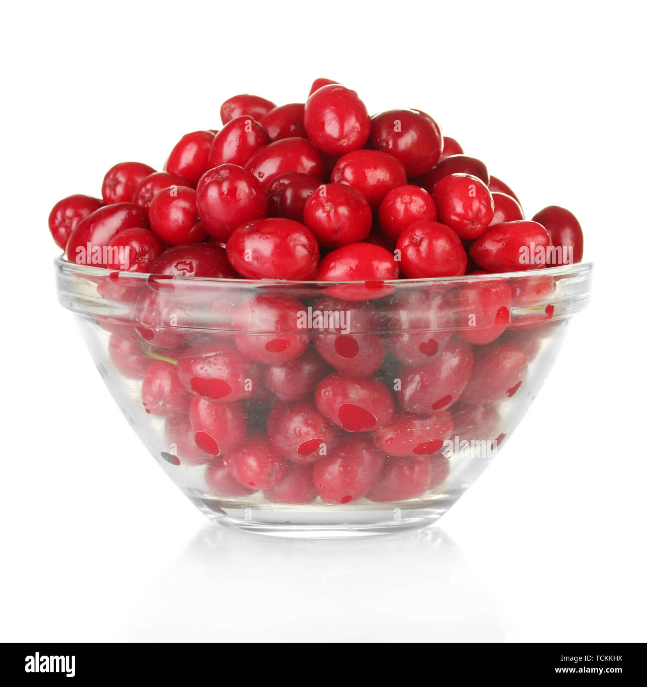 fresh cornel berries in glass bowl isolated on white Stock Photo - Alamy