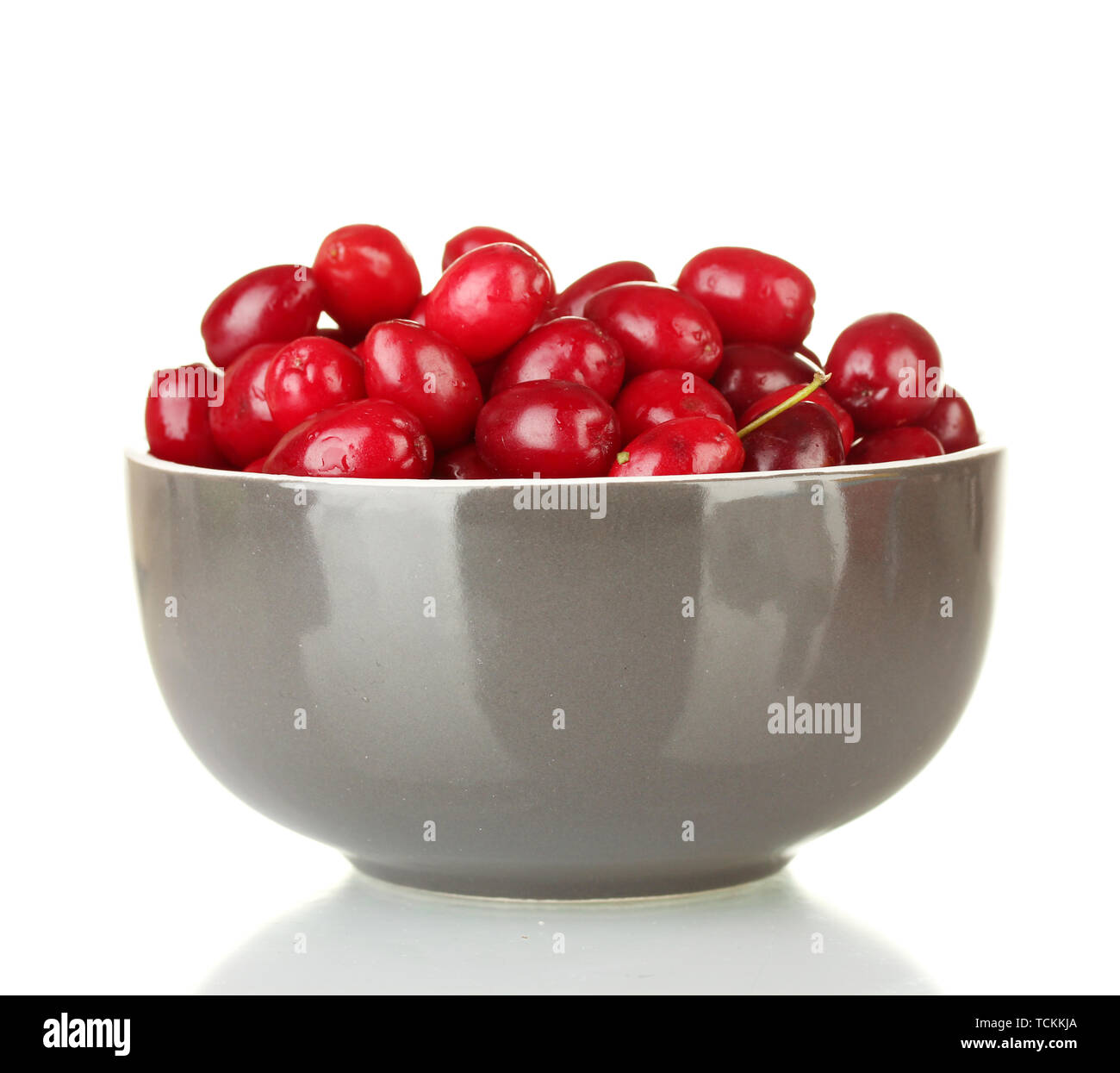 fresh cornel berries in bowl isolated on white Stock Photo - Alamy