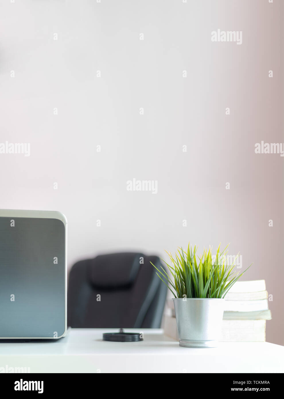 Fresh green grass on the office desk with copy space Stock Photo - Alamy