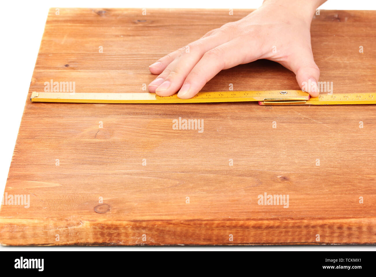 measuring wooden board close-up Stock Photo - Alamy