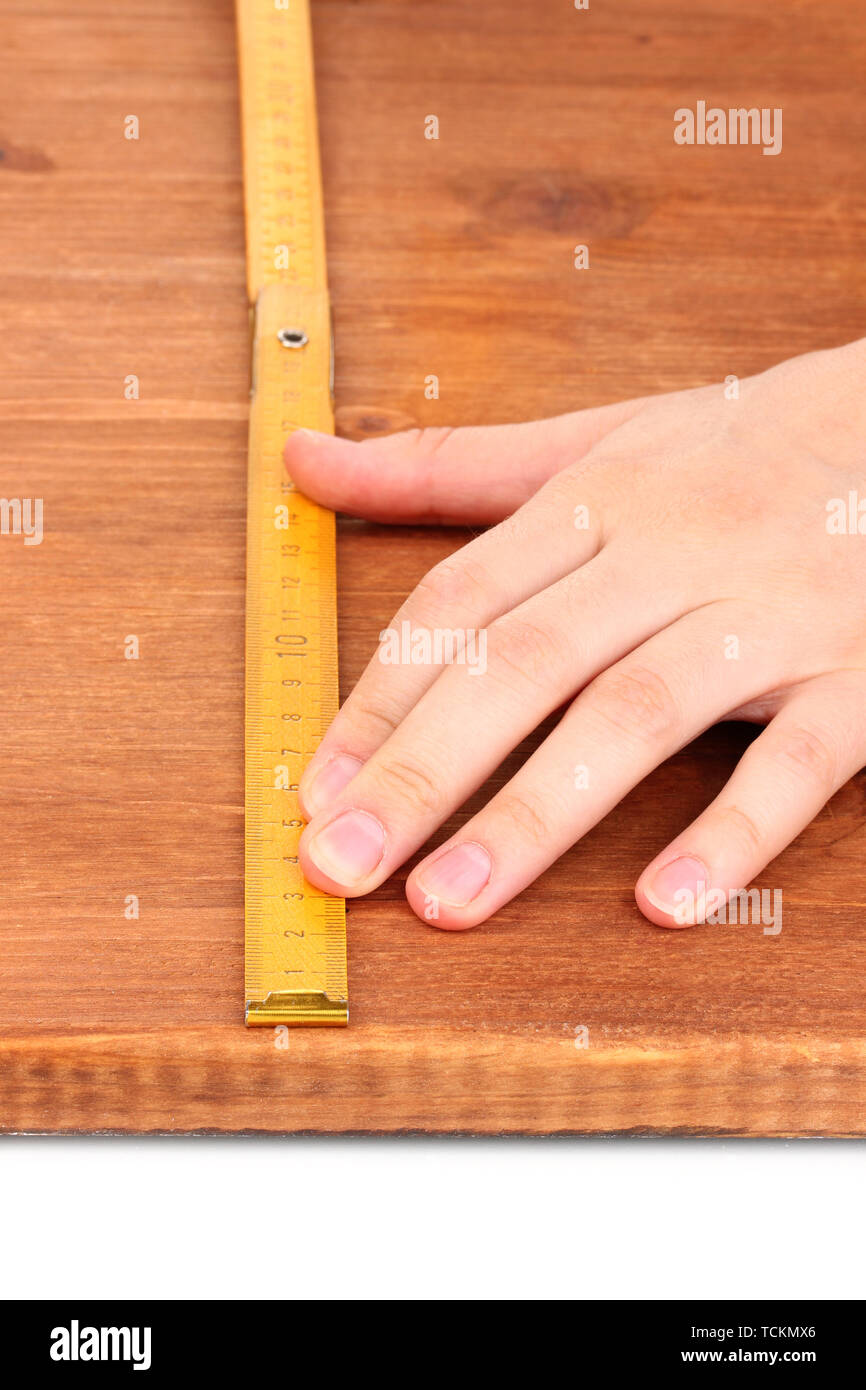 measuring wooden board close-up Stock Photo - Alamy