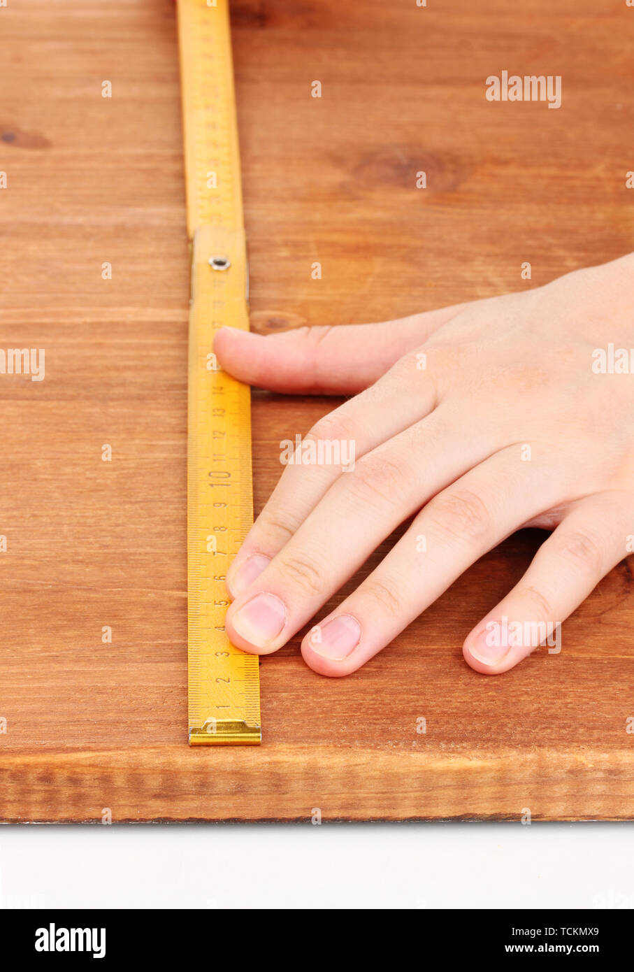 measuring wooden board close-up Stock Photo - Alamy