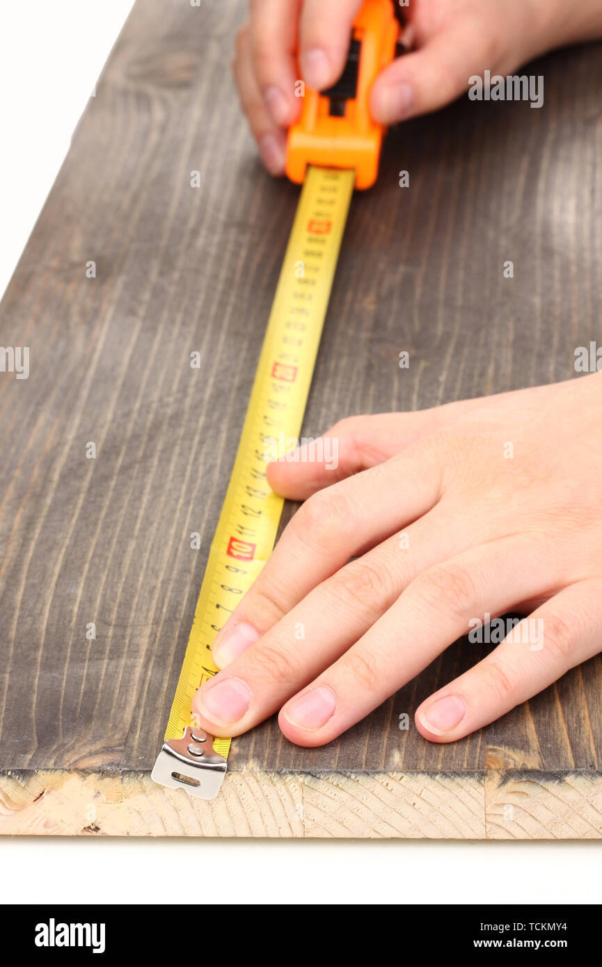 measuring wooden board close-up Stock Photo - Alamy