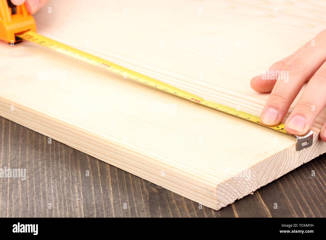 measuring wooden board close-up Stock Photo - Alamy
