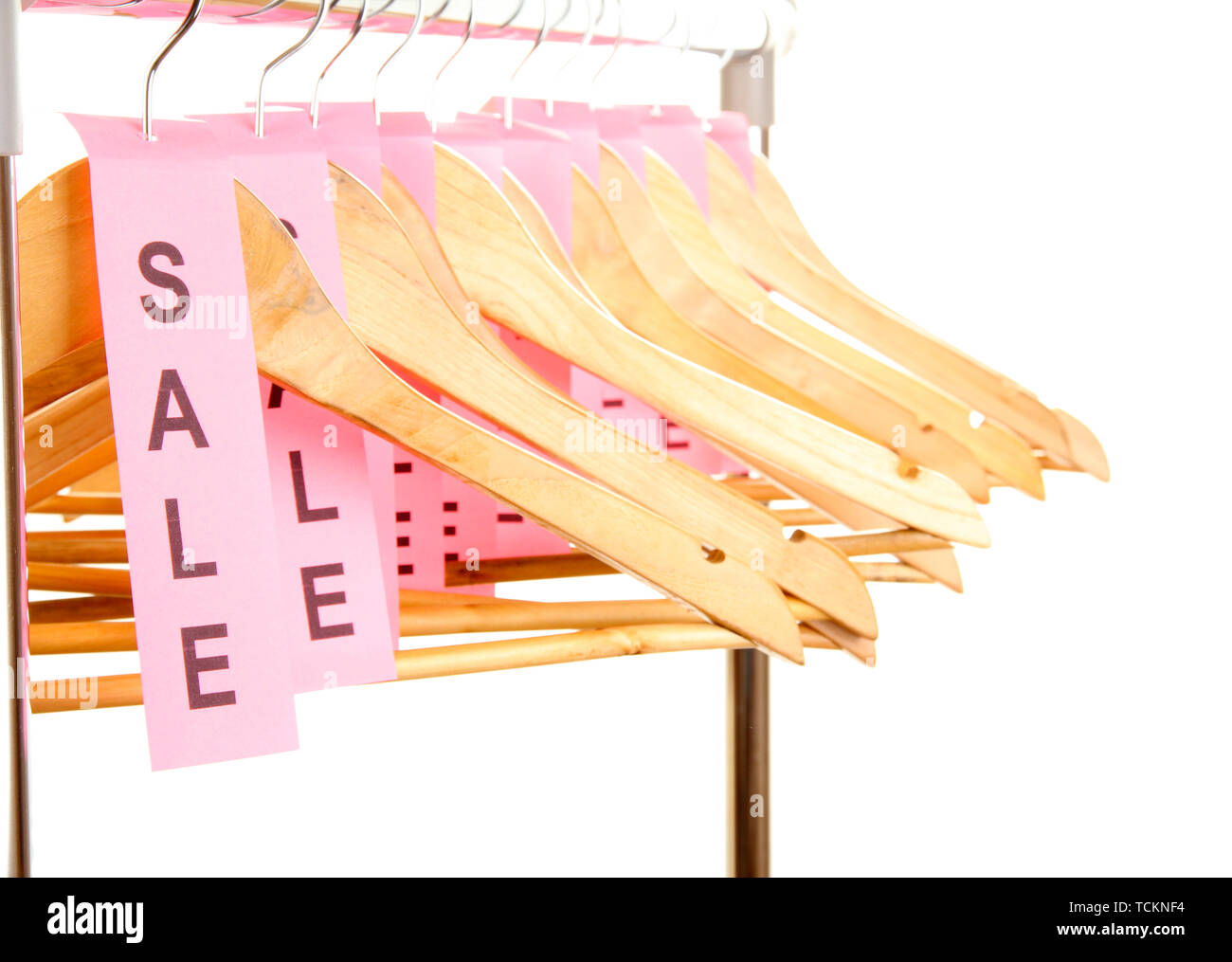 wooden clothes hangers as sale symbol isolated on white Stock Photo - Alamy