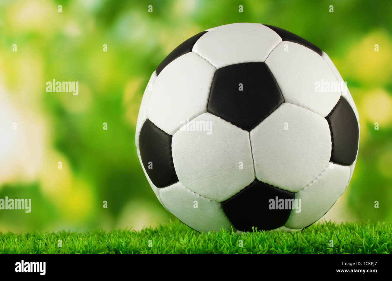 football ball on green grass Stock Photo - Alamy