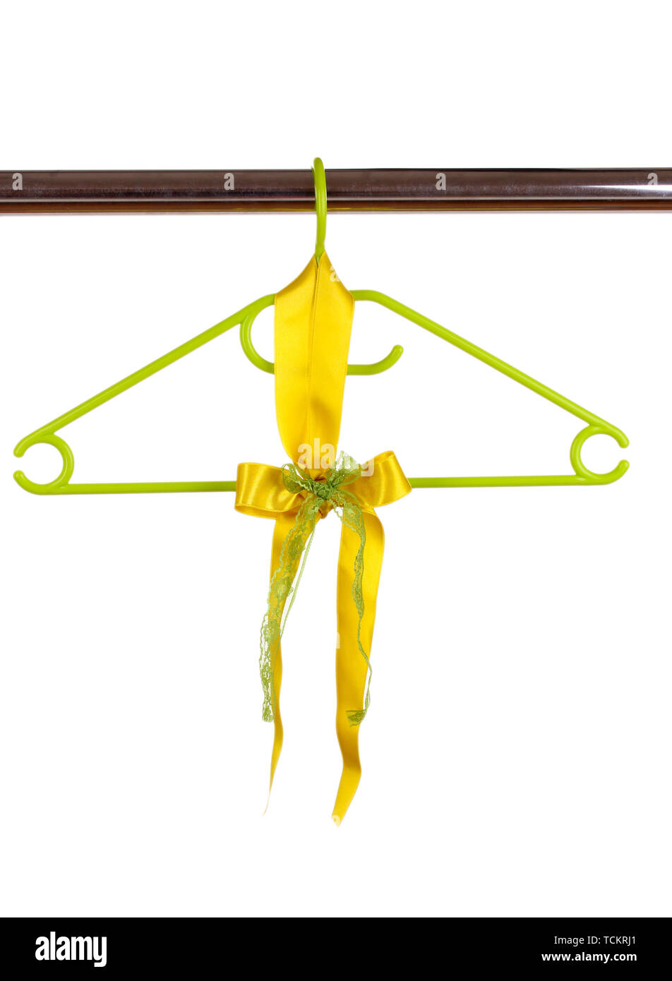 Beautiful yellow bow hanging on wooden hanger isolated on white Stock ...