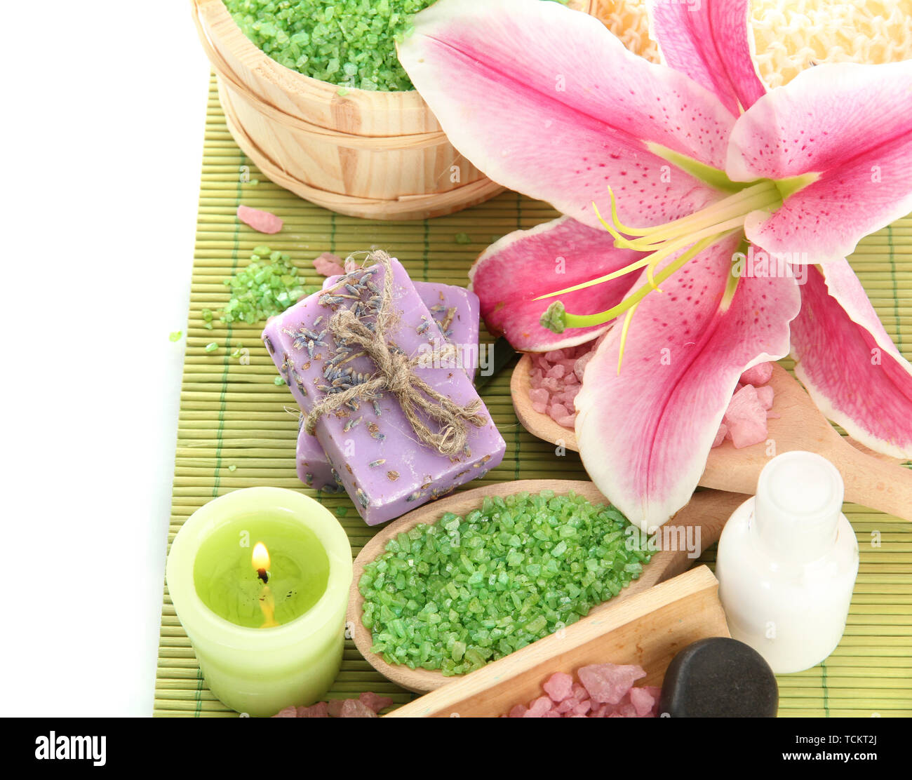 beautiful spa setting with lily isolated on white Stock Photo - Alamy
