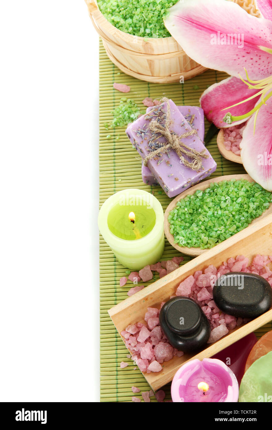 beautiful spa setting with lily isolated on white Stock Photo - Alamy