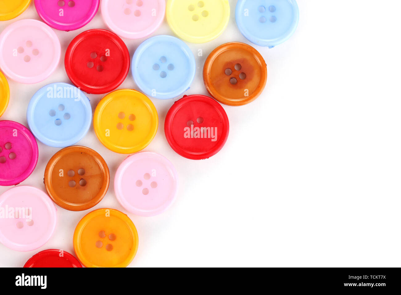 Colorful sewing buttons isolated on white Stock Photo - Alamy