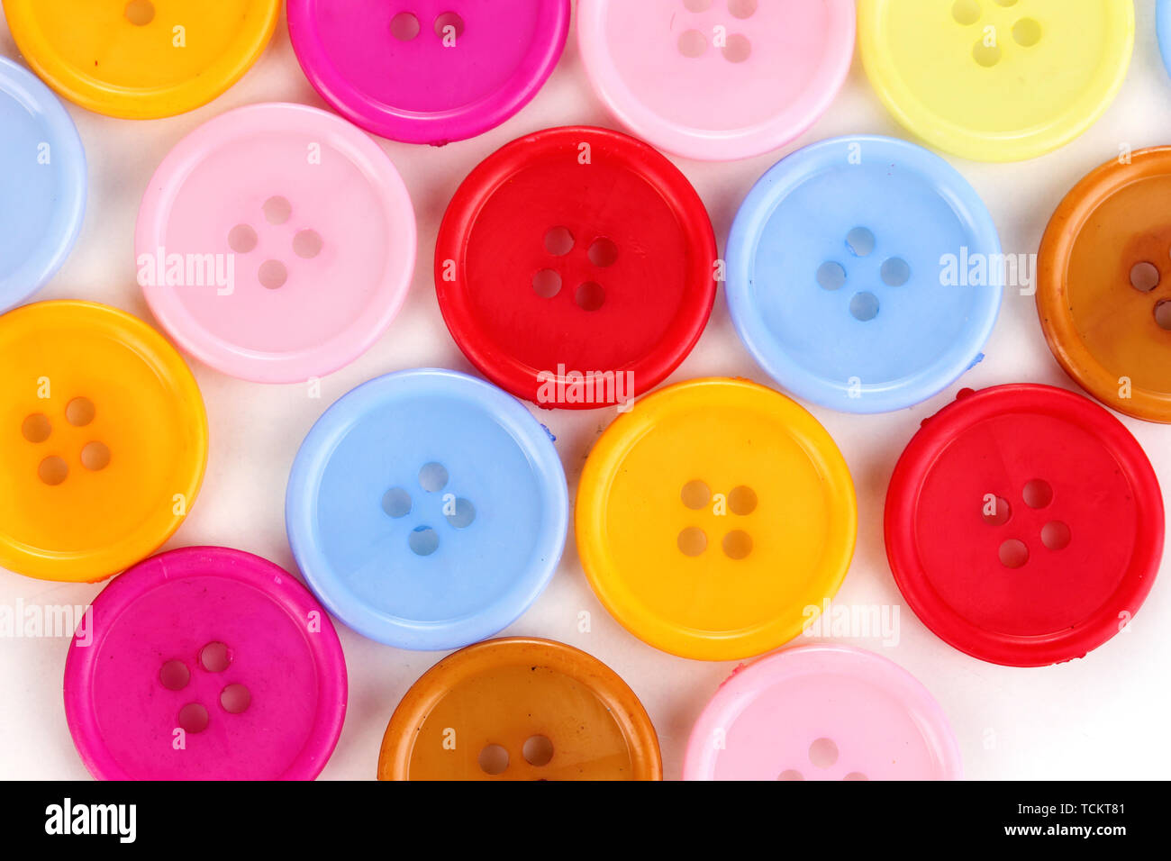 Colorful sewing buttons isolated on white Stock Photo - Alamy