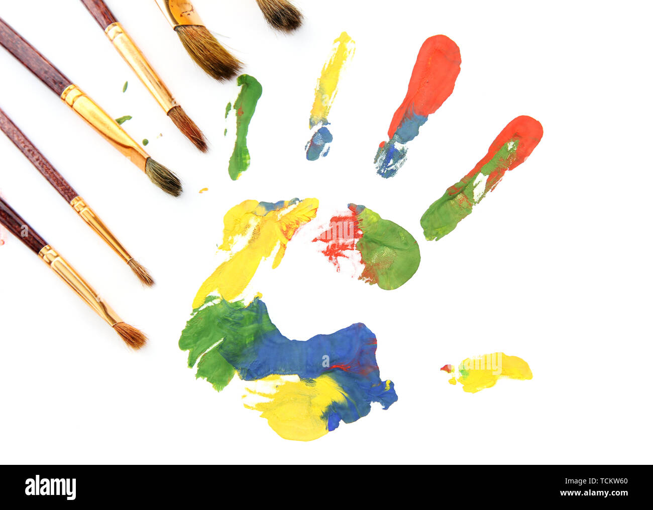 Color hand print with brushes, isolated on white Stock Photo - Alamy