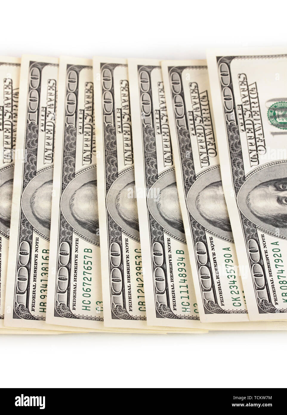 pack of dollars on white background close-up Stock Photo - Alamy
