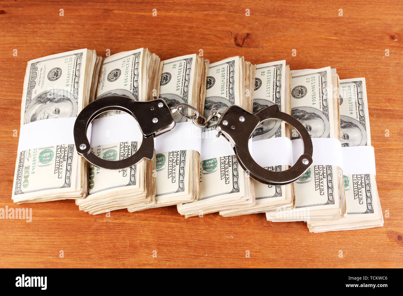 idea of punishment for financial fraud, on wooden background Stock ...