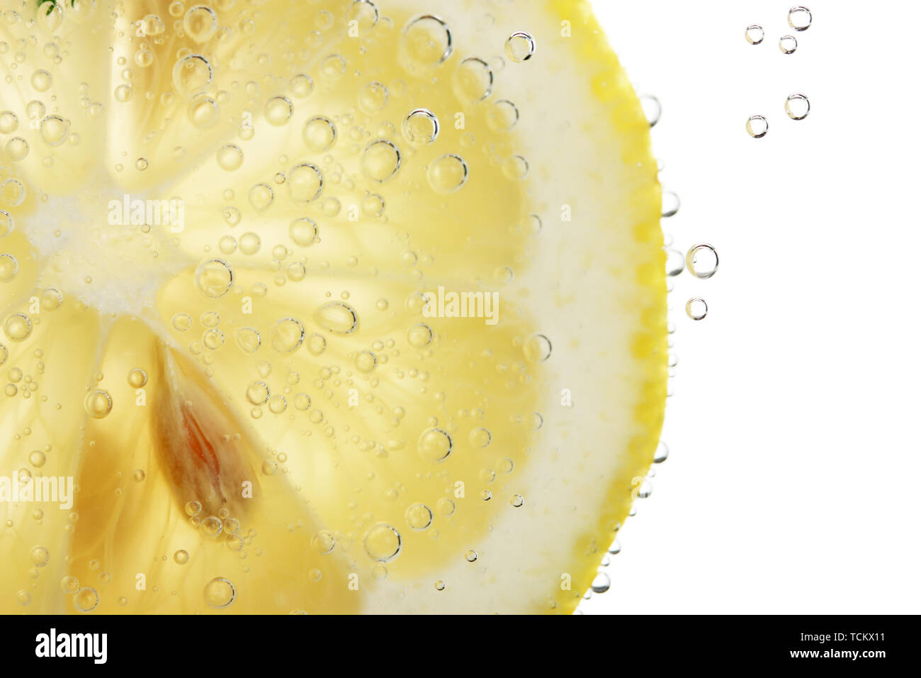 slice of lemon in the water with bubbles, isolated on white Stock Photo ...