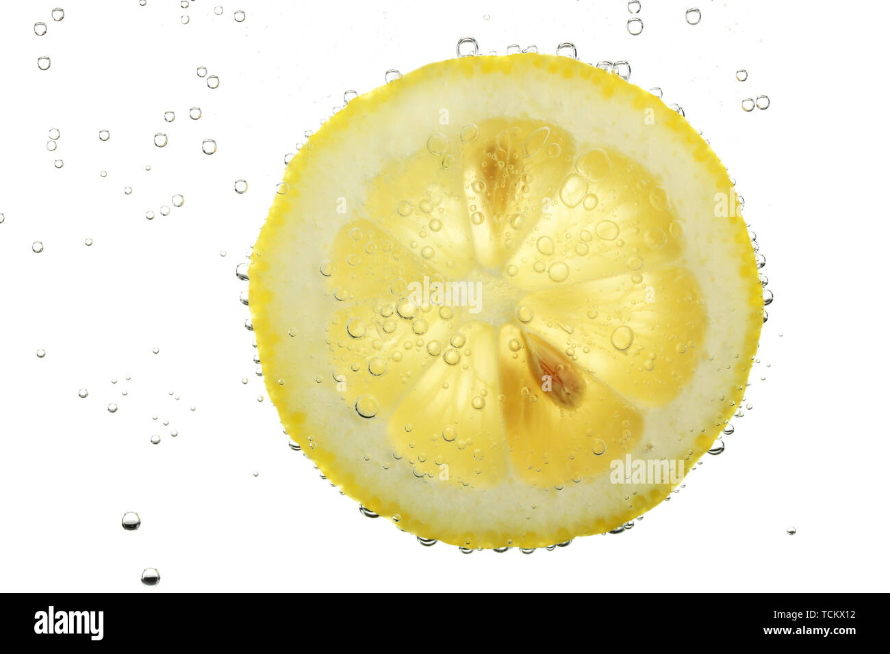 slice of lemon in the water with bubbles, isolated on white Stock Photo ...