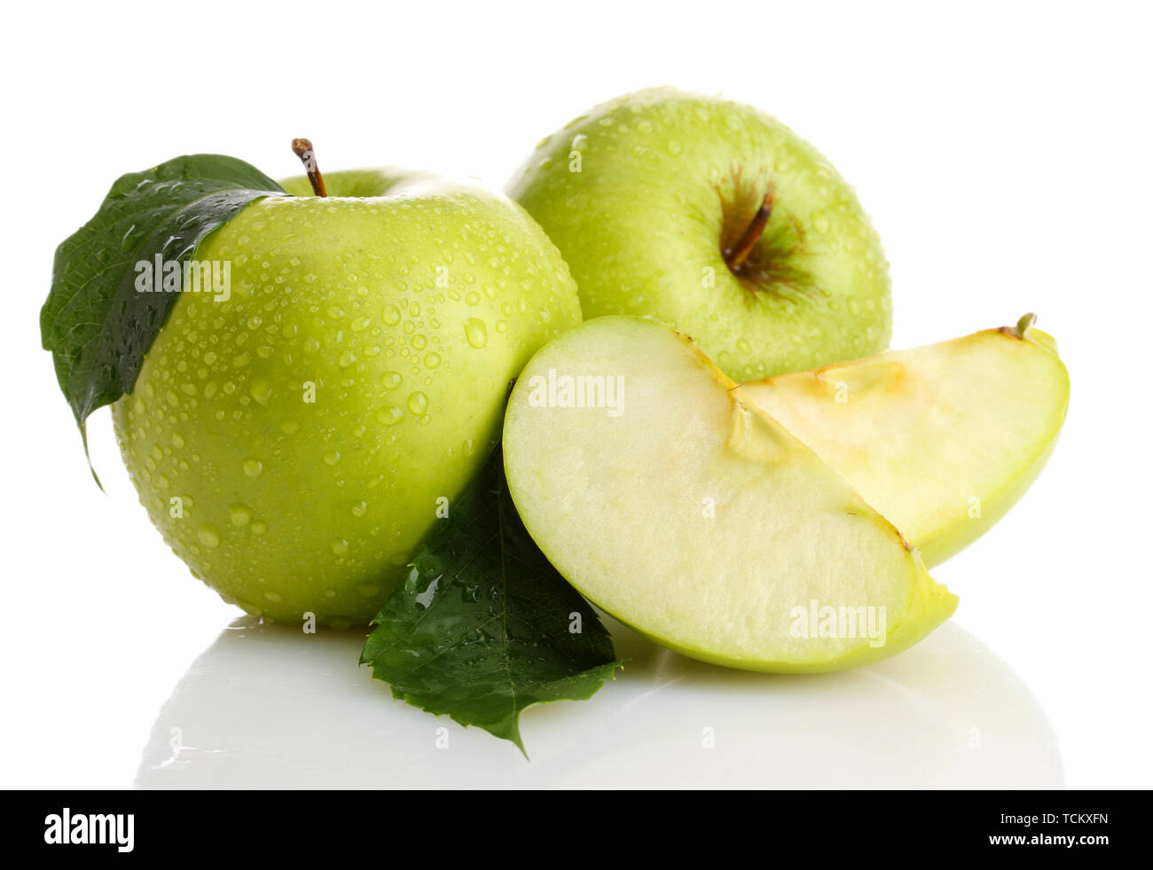Ripe green apples with leaf and slice, isolated on white Stock Photo ...