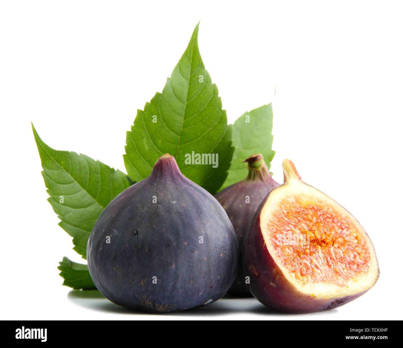 Ripe sweet figs with leaves isolated on white Stock Photo - Alamy
