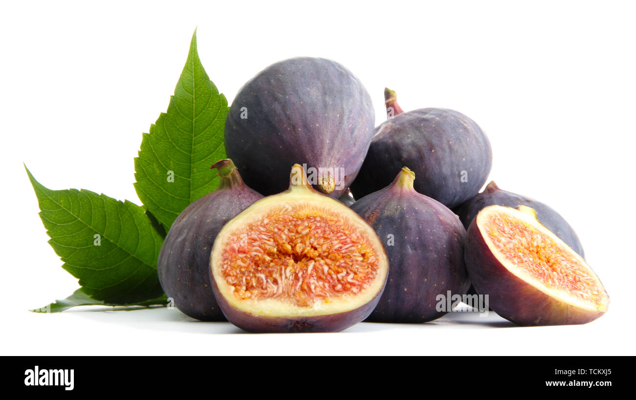Ripe sweet figs with leaves isolated on white Stock Photo - Alamy
