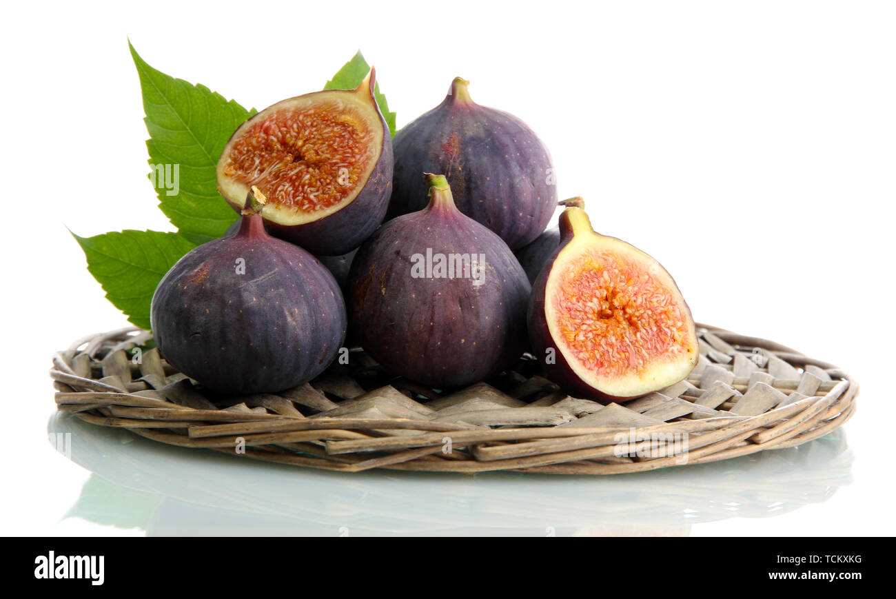 Ripe sweet figs with leaves isolated on white Stock Photo - Alamy