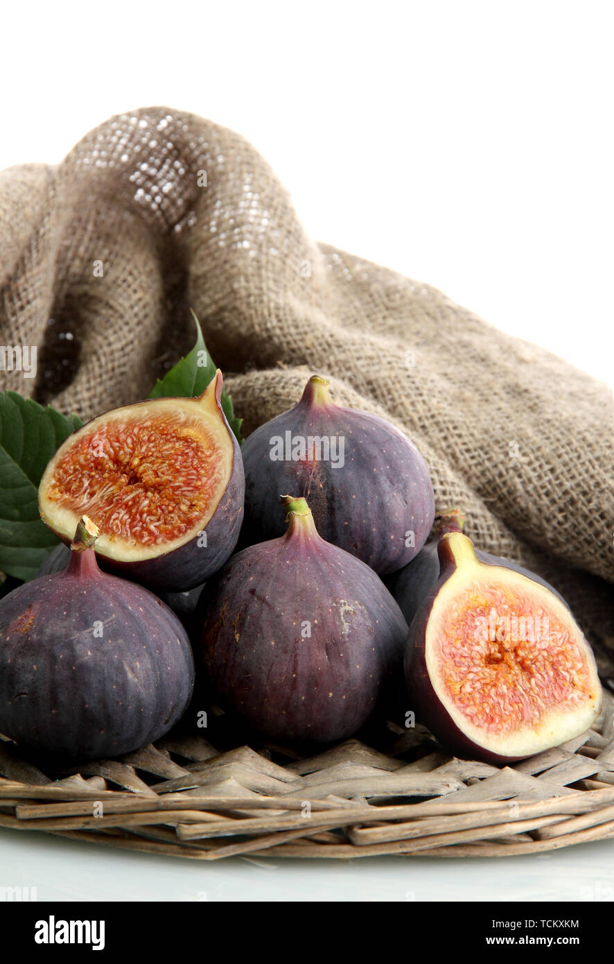 Ripe sweet figs with leaves isolated on white Stock Photo - Alamy