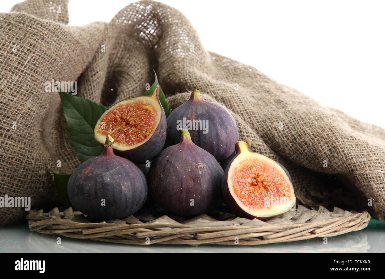 Ripe sweet figs with leaves isolated on white Stock Photo - Alamy