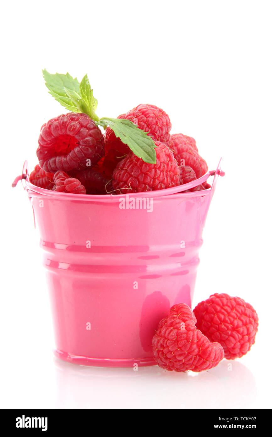 beautiful raspberries in bucket isolated on white Stock Photo - Alamy