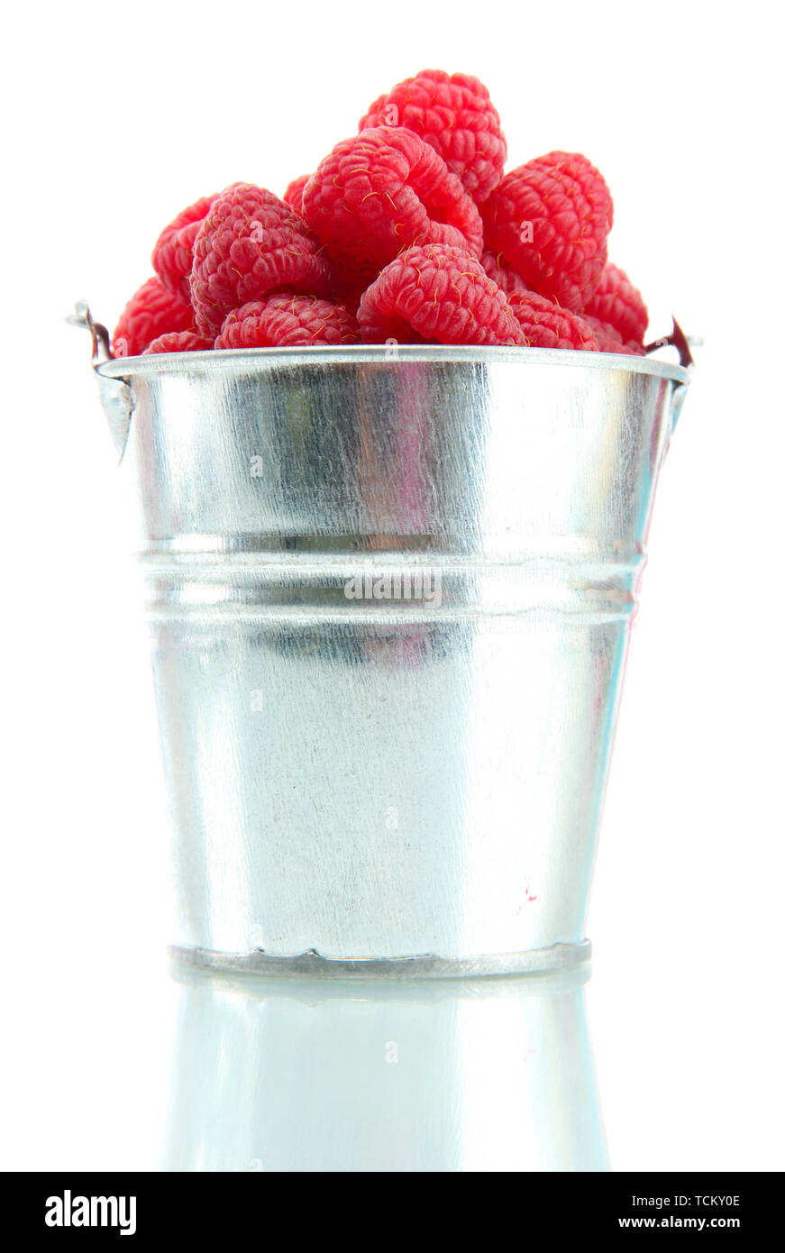beautiful raspberries in bucket isolated on white Stock Photo - Alamy