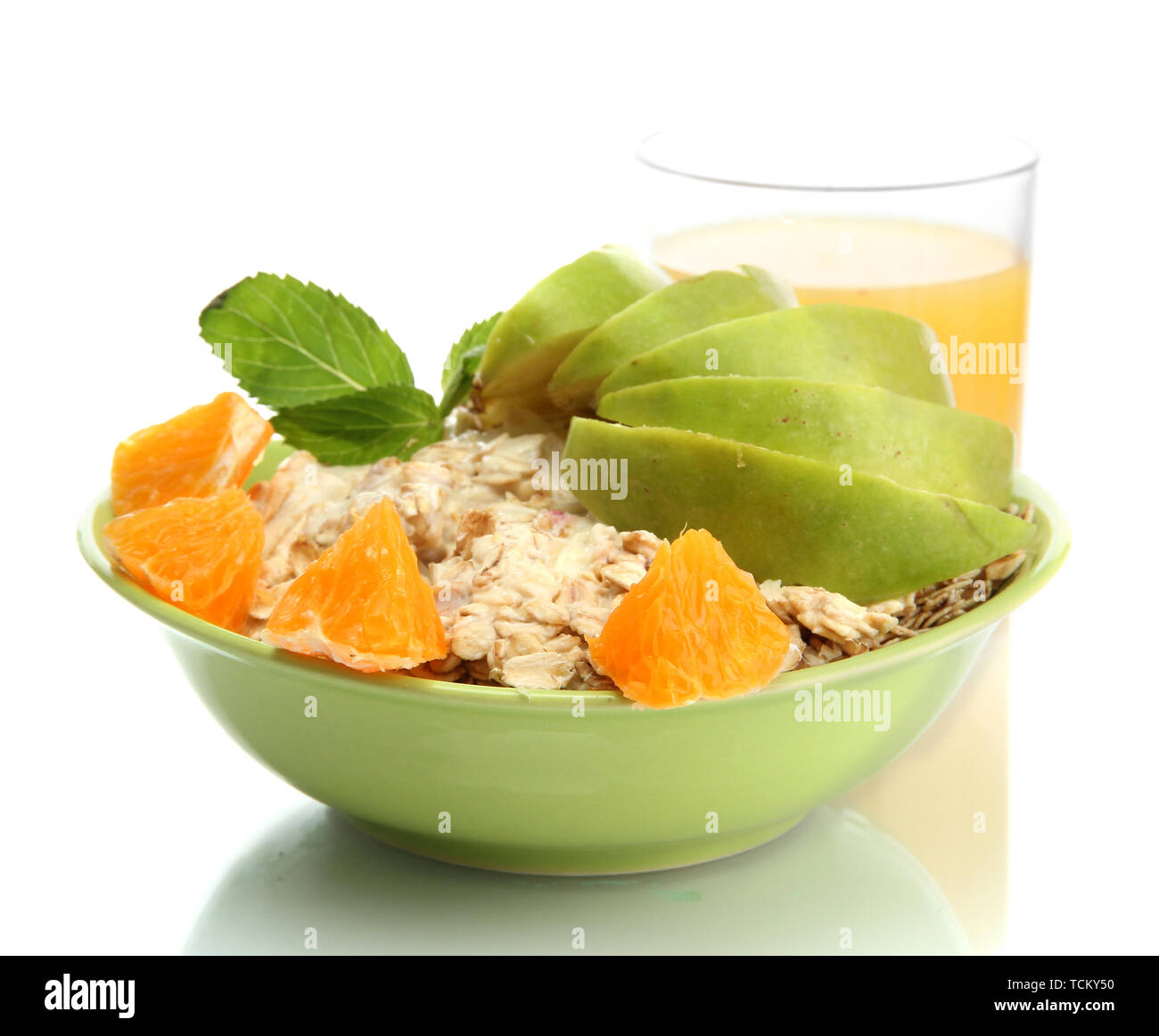 tasty oatmeal with fruits and glass of juice, isolated on white Stock ...