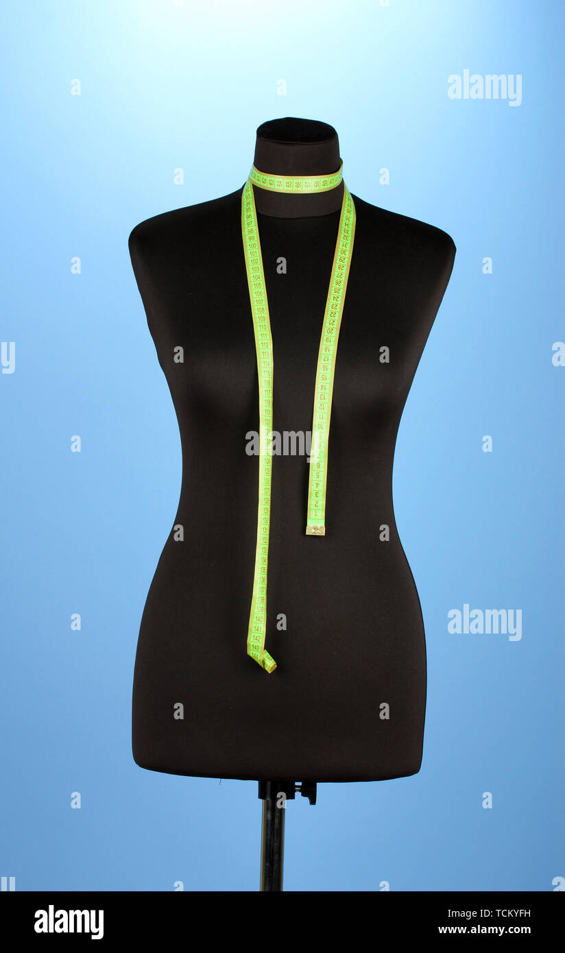 empty black mannequin with measuring tape on blue background Stock ...