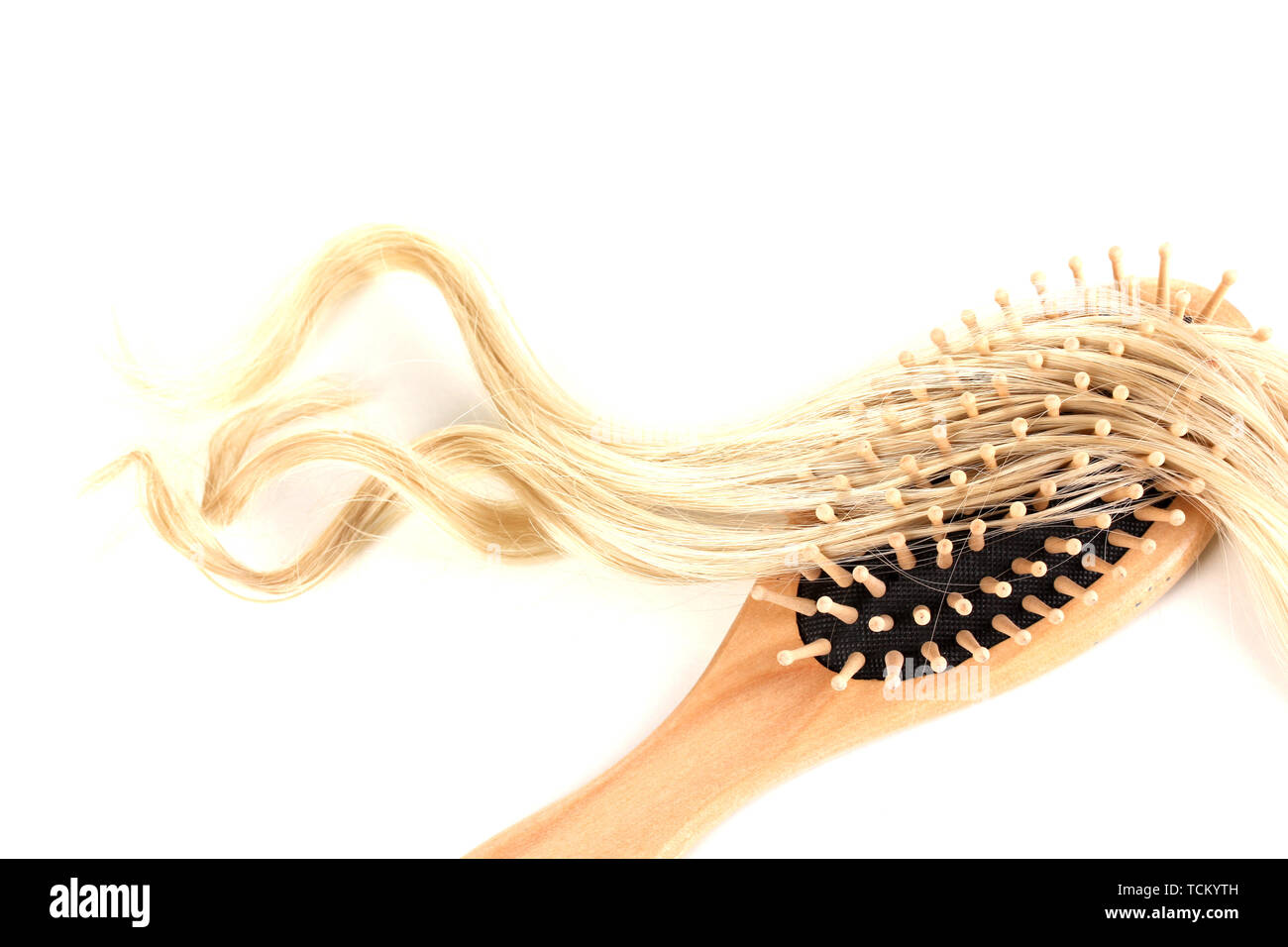 Blond curls brushing comb isolated on white Stock Photo - Alamy
