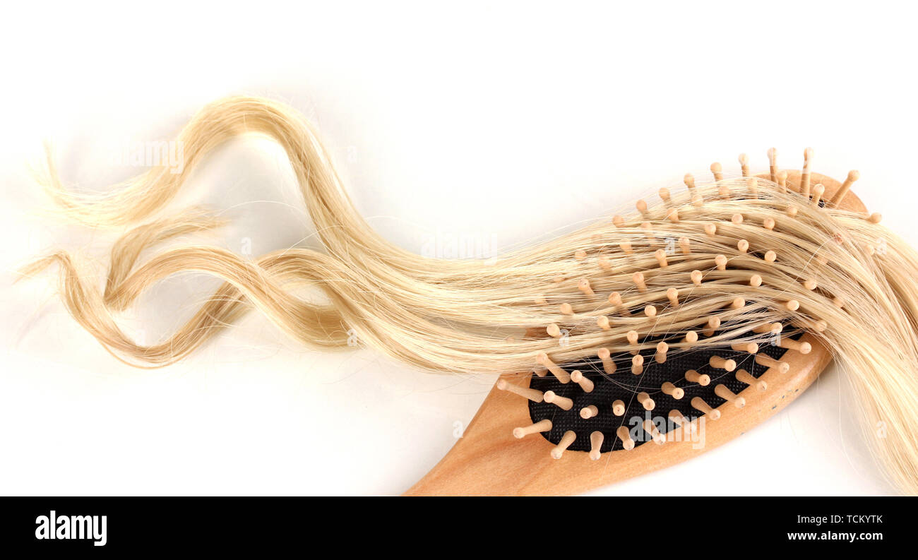 Blond curls brushing comb isolated on white Stock Photo - Alamy