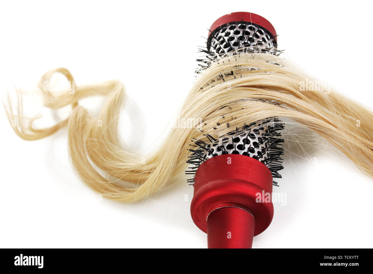 Blond curls brushing comb isolated on white Stock Photo - Alamy