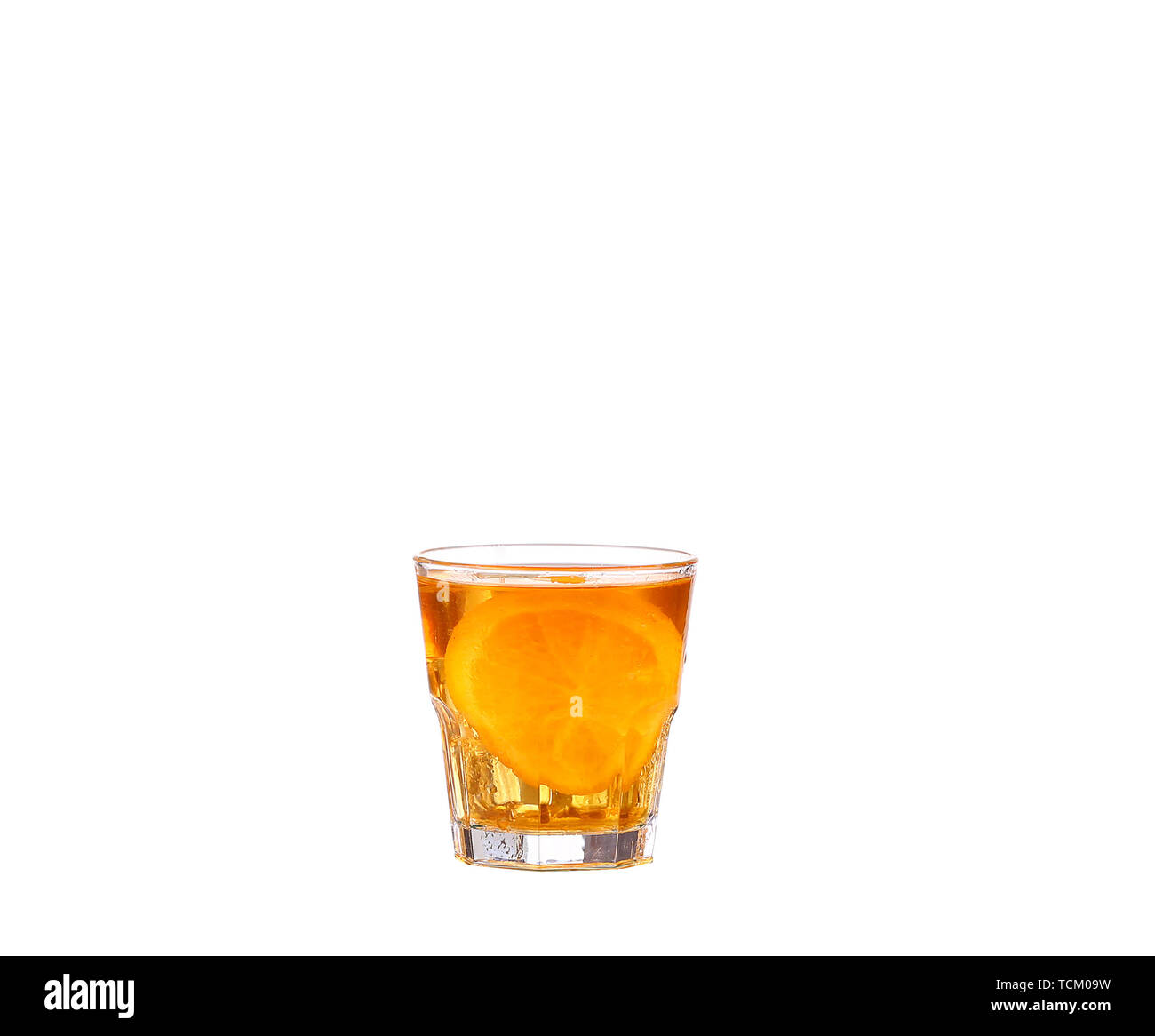 Amber cocktail in a glass isolated on a white background Stock Photo ...