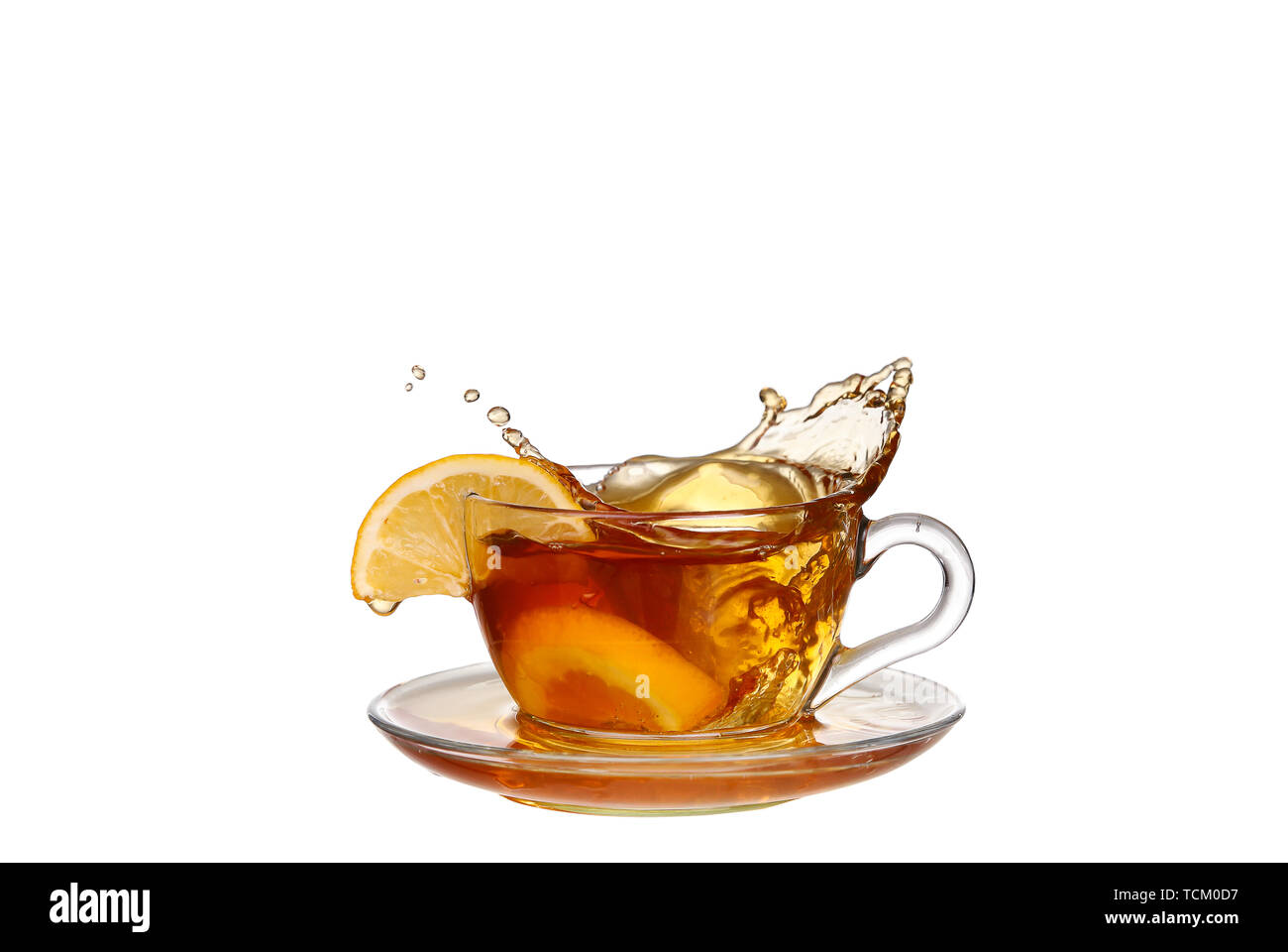 lemon tea with a splash on a white background Stock Photo - Alamy