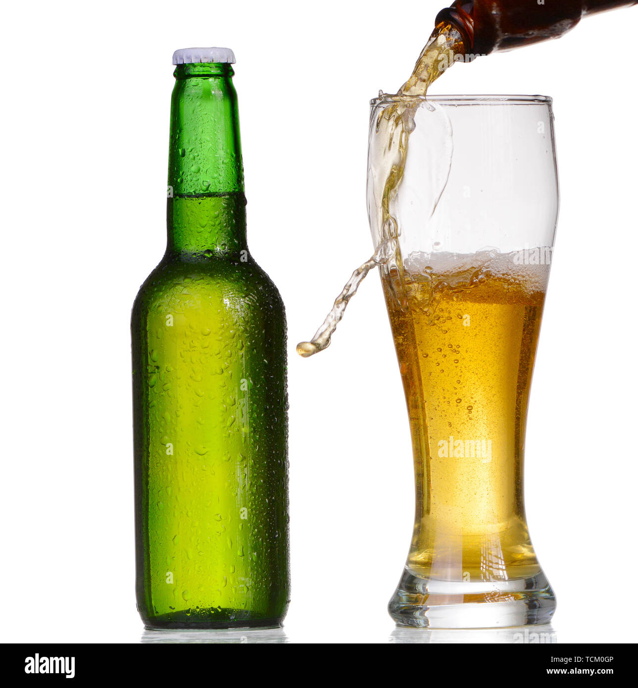 Beer bottle with drops isolated on wgite Stock Photo - Alamy