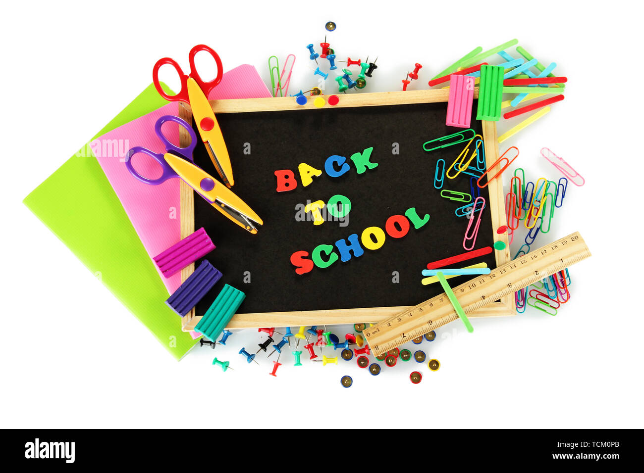 Small chalkboard with school supplies on white background. Back to ...