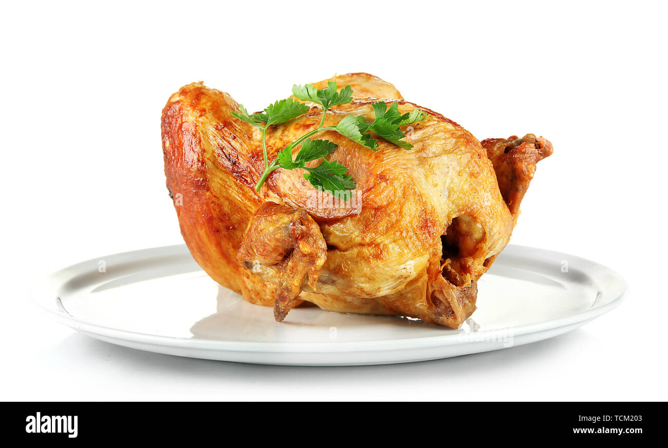 Roasted whole chicken on a white plate isolated on white Stock Photo ...