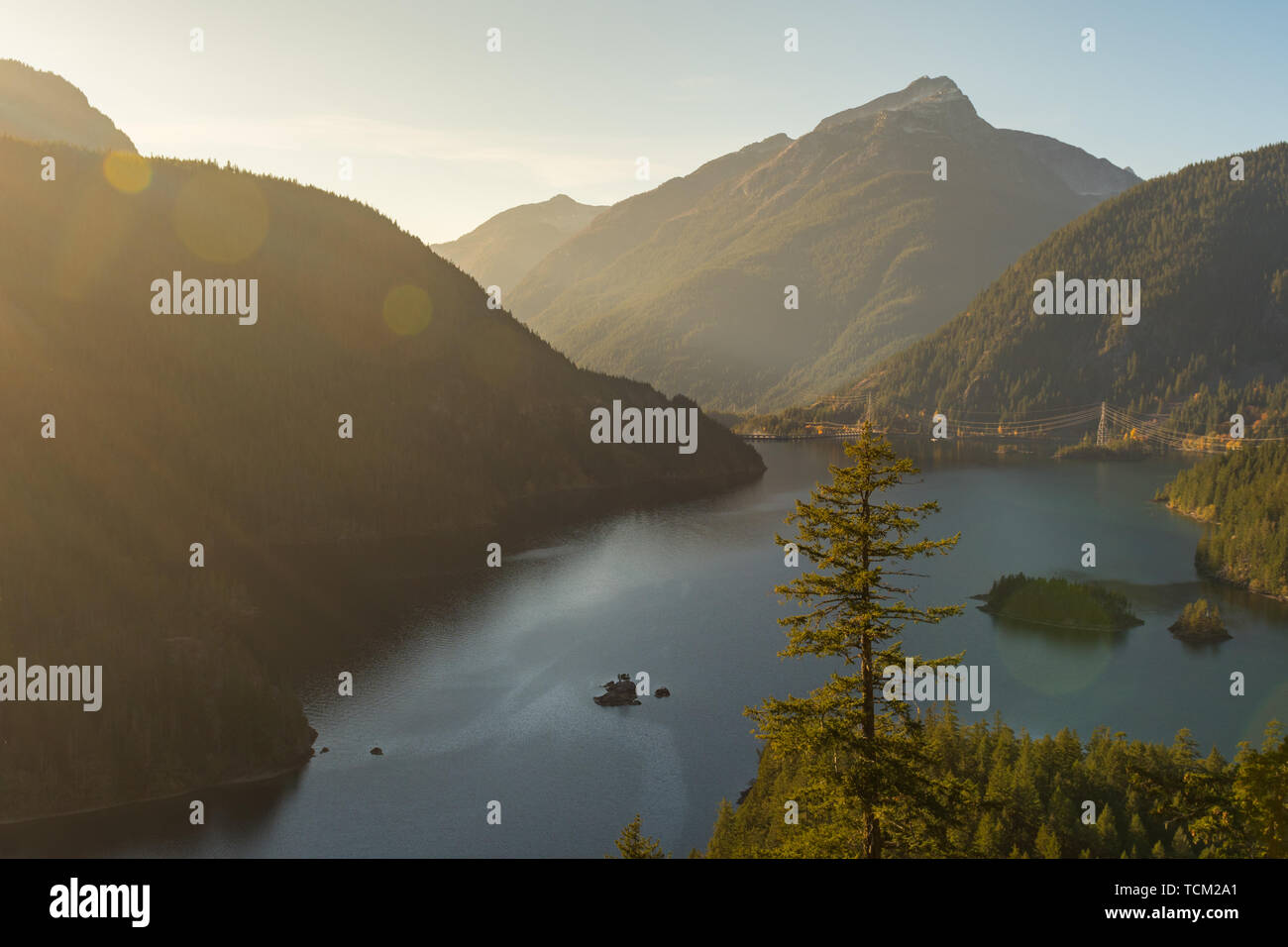 Sunset views of Diablo Lake surrounded by mountains, in North Cascades ...