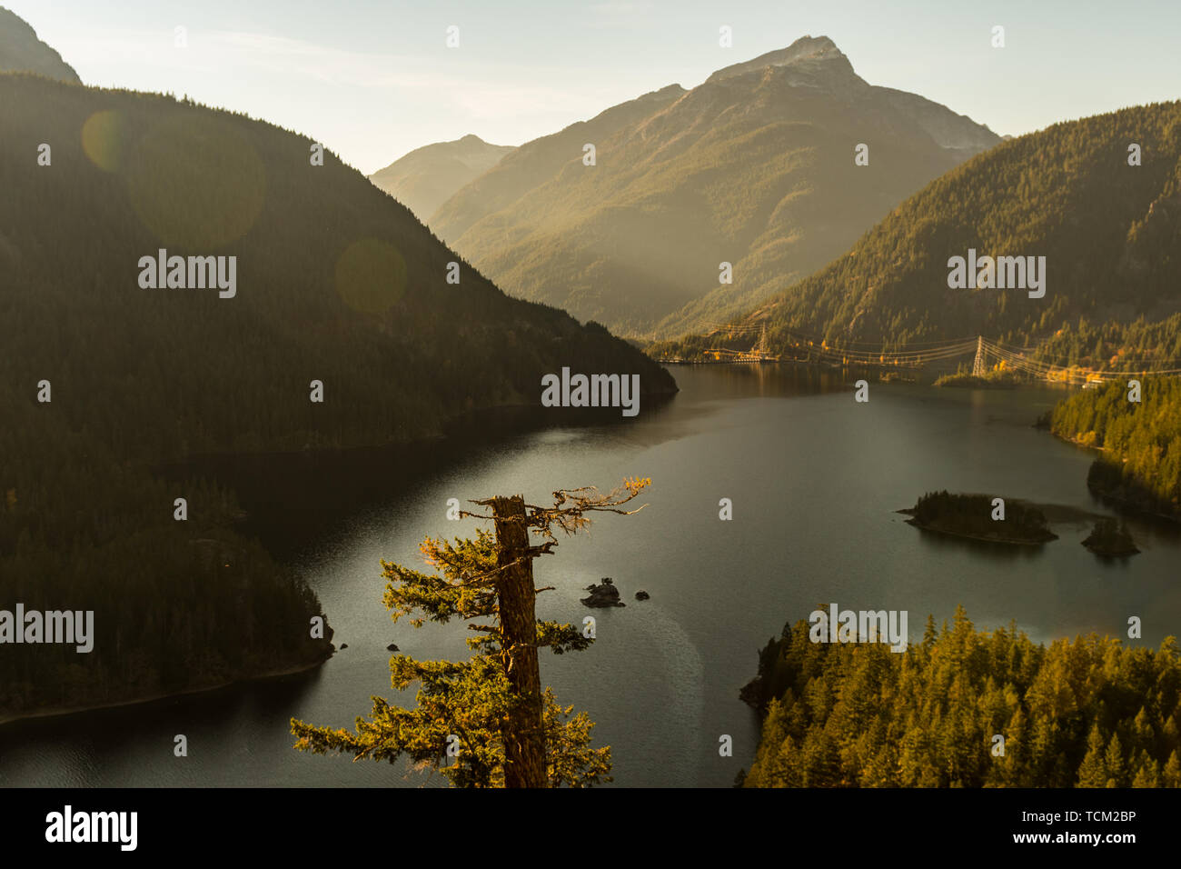 Sunset views of Diablo Lake surrounded by mountains, in North Cascades ...