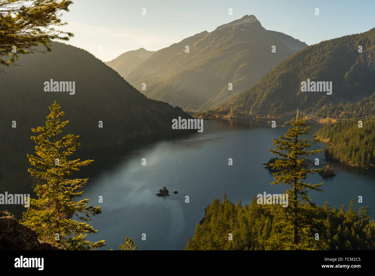 Sunset views of Diablo Lake surrounded by mountains, in North Cascades ...
