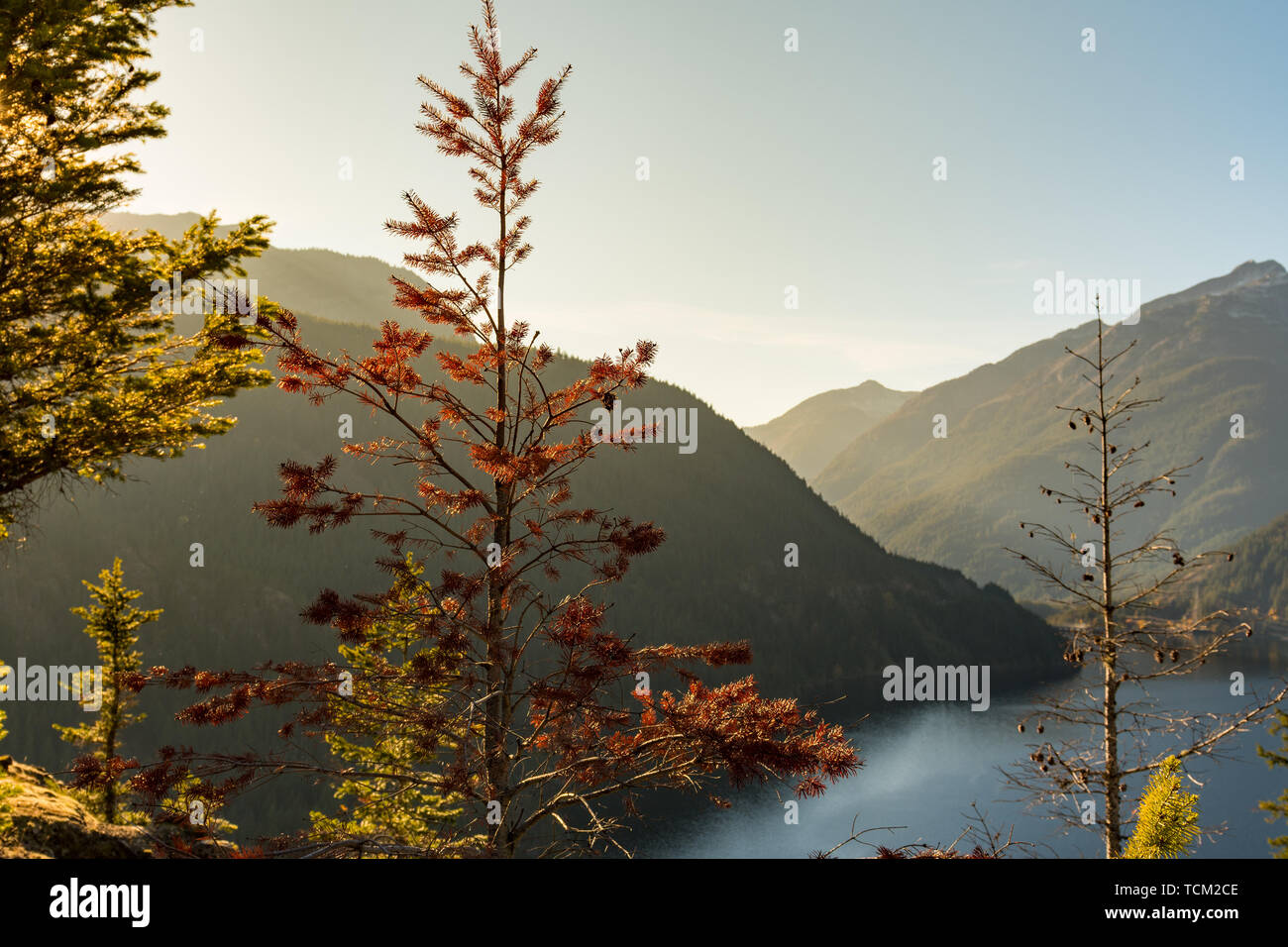 Sunset views of Diablo Lake surrounded by mountains, in North Cascades ...
