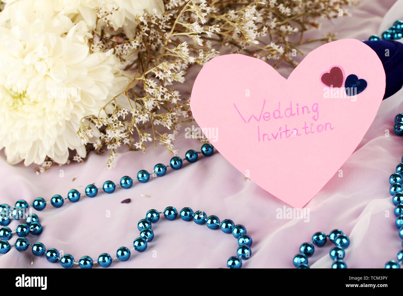 wedding invitations on decorated table close-up Stock Photo - Alamy
