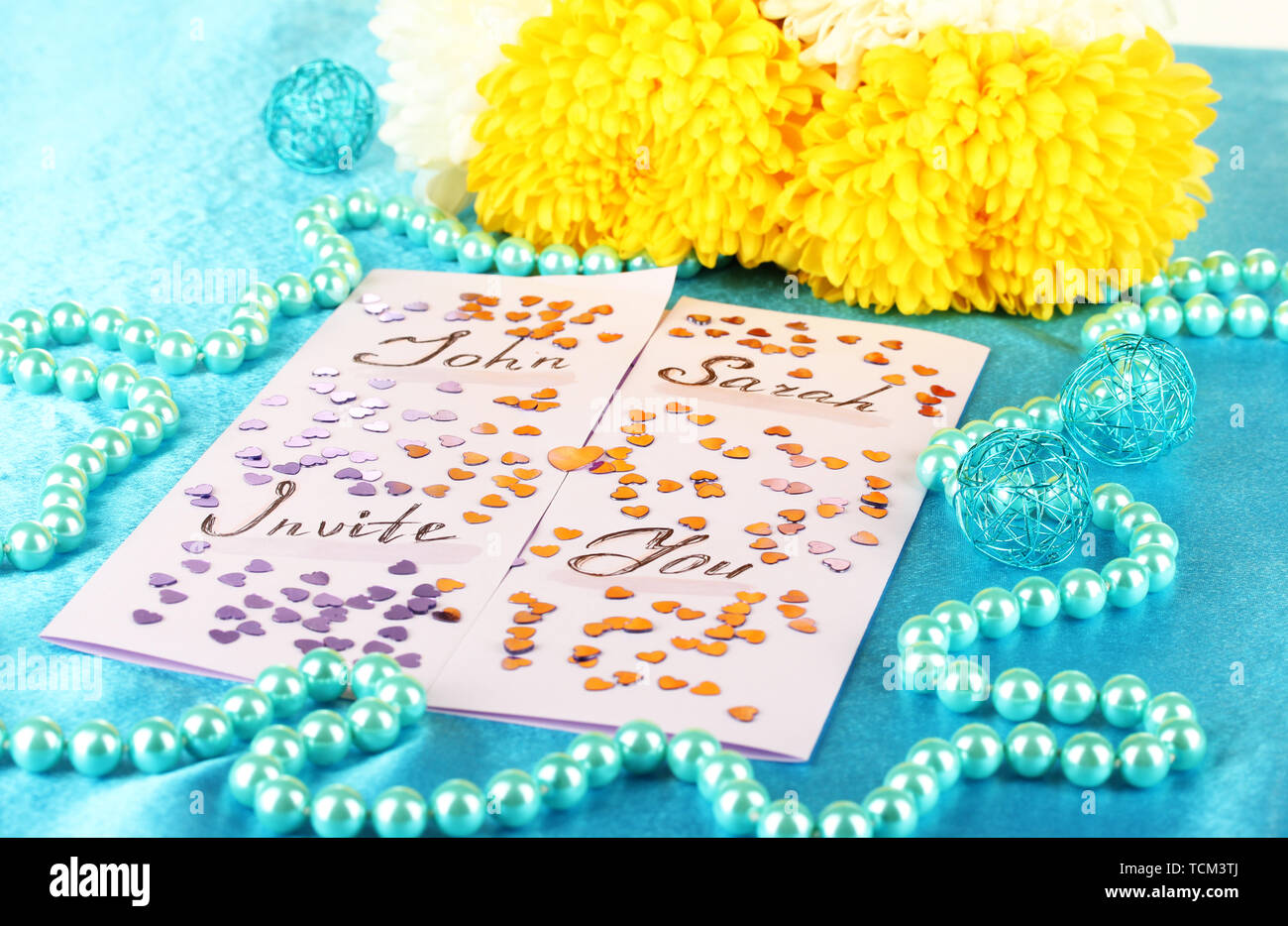 wedding invitations on decorated table close-up Stock Photo - Alamy