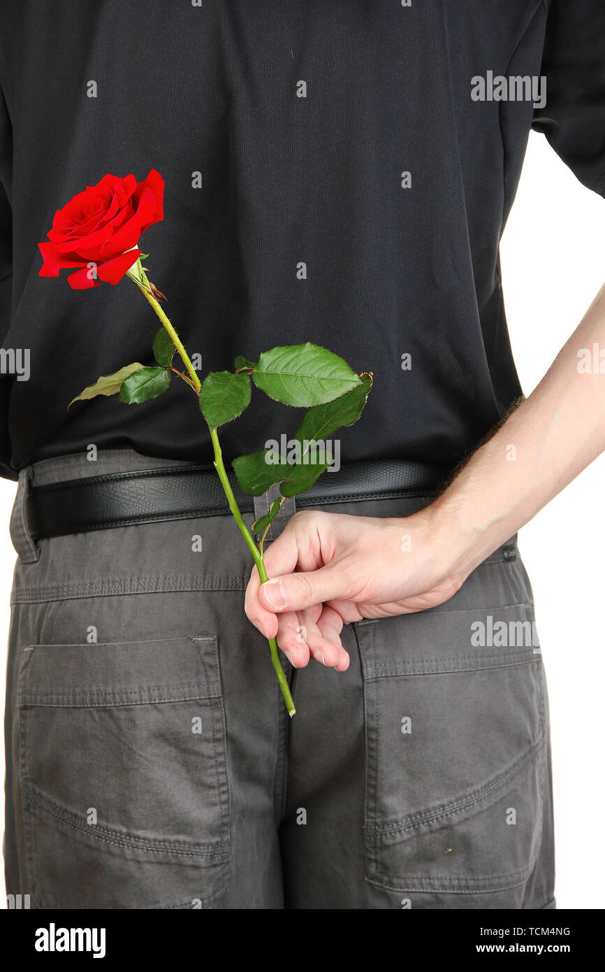 Guy holding red rose behind hi-res stock photography and images - Alamy